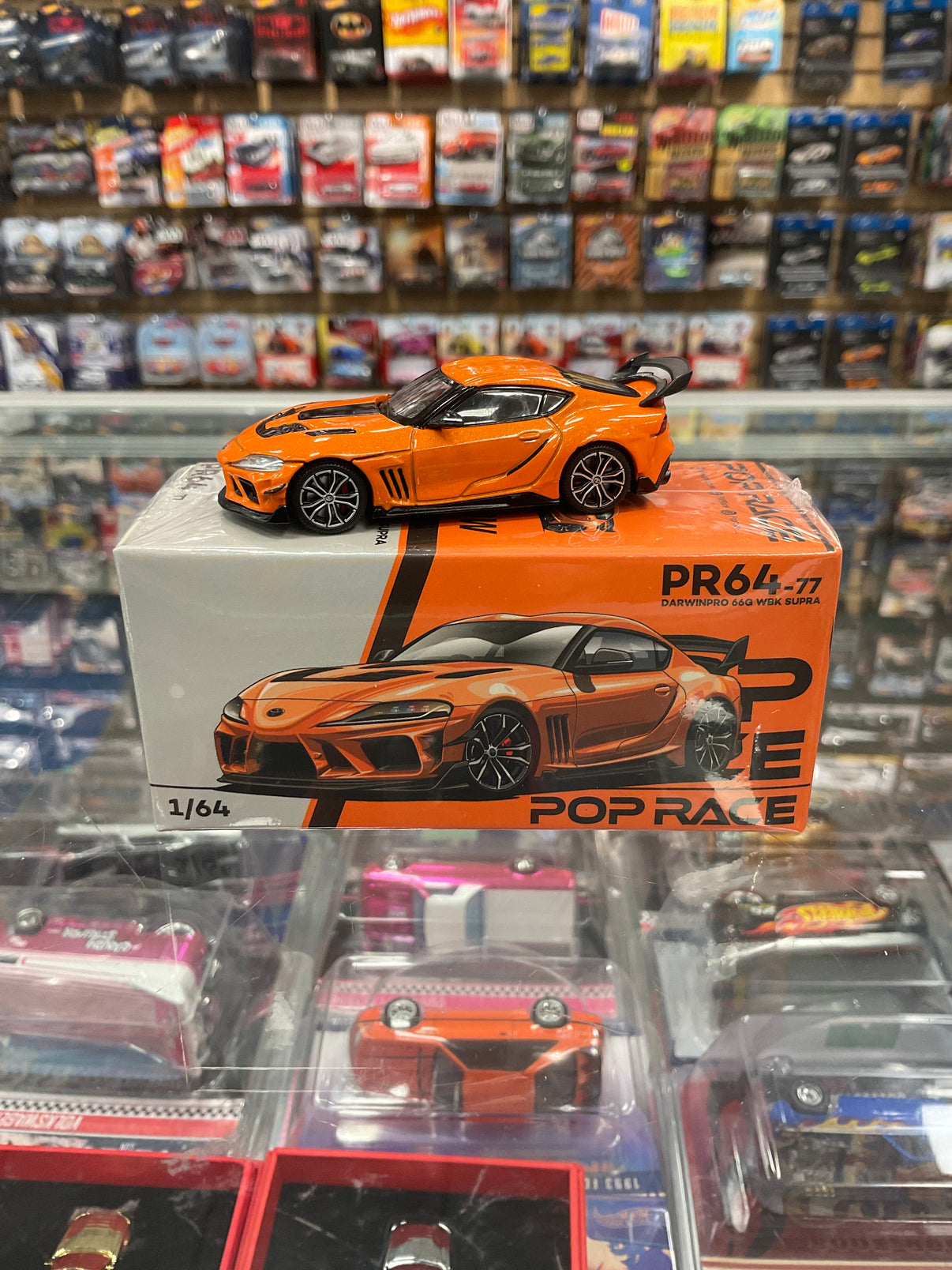 Pop Race PR64-77 Darwinpro 66G WBK Supra Orange – Diecastz